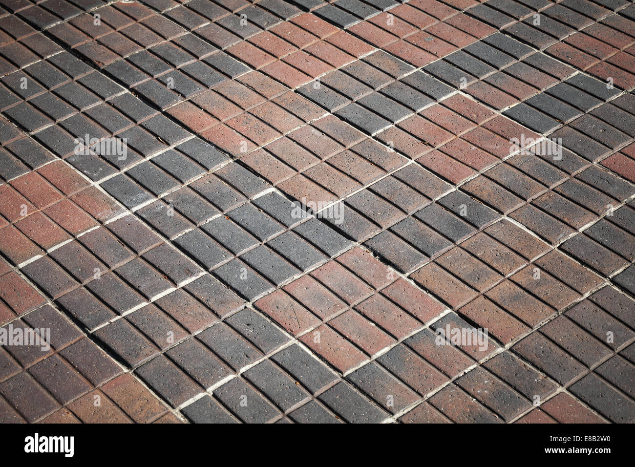 Abstract background texture of modern red cobblestone road pavement ...