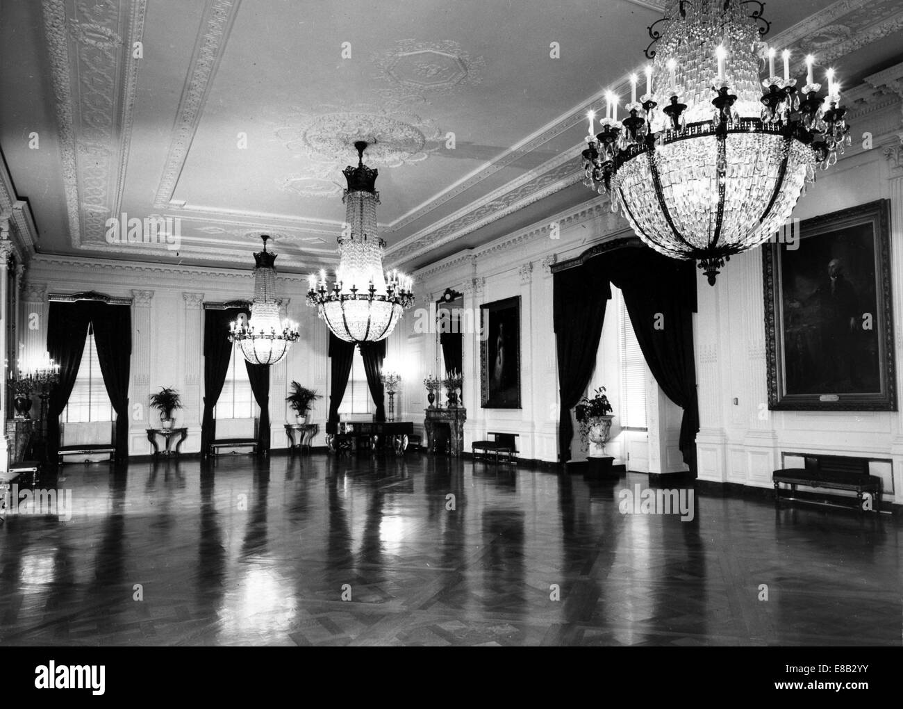 East Room of the White House including the portraits of George and ...