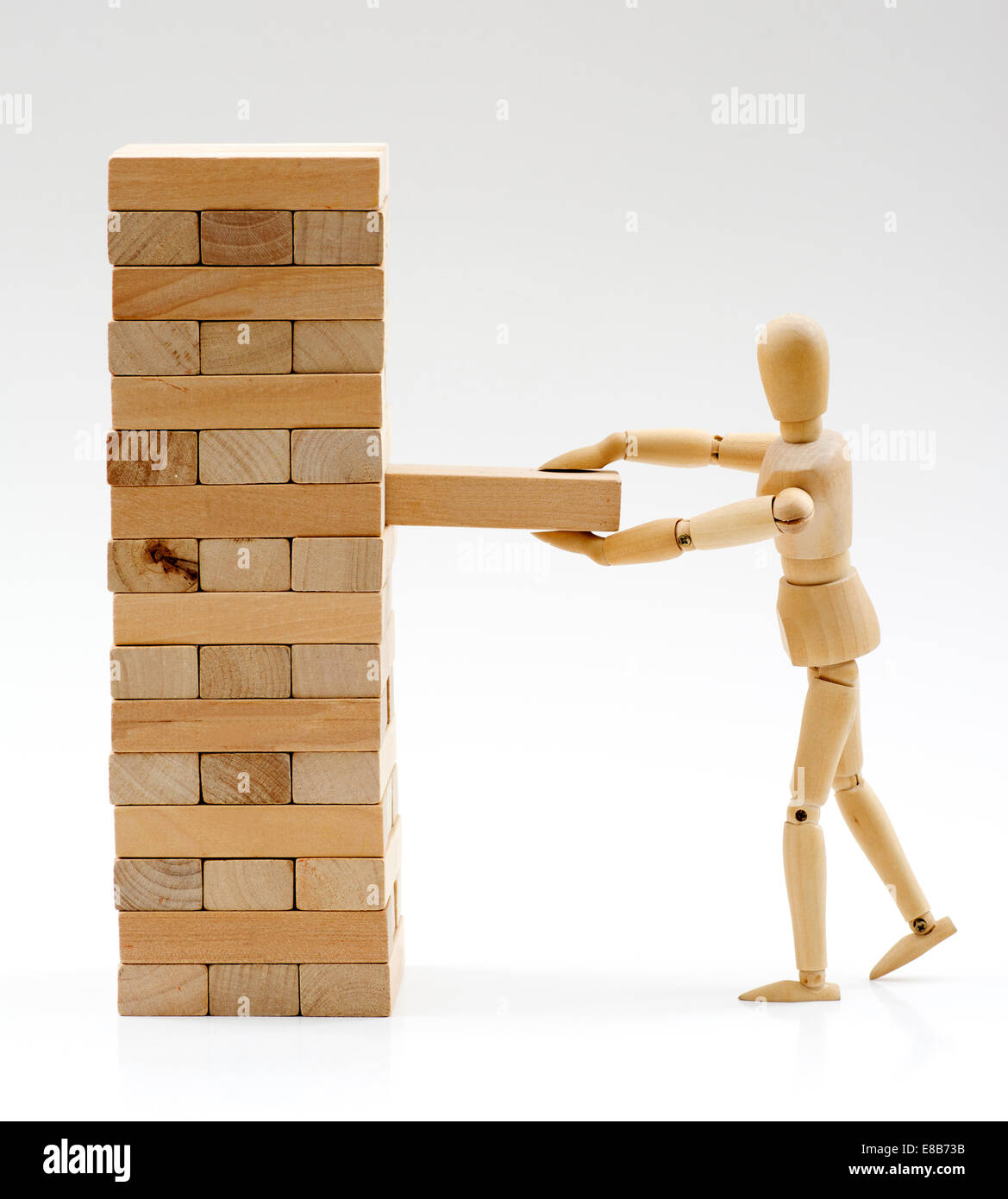 Wooden blocks and wooden model in action Stock Photo - Alamy