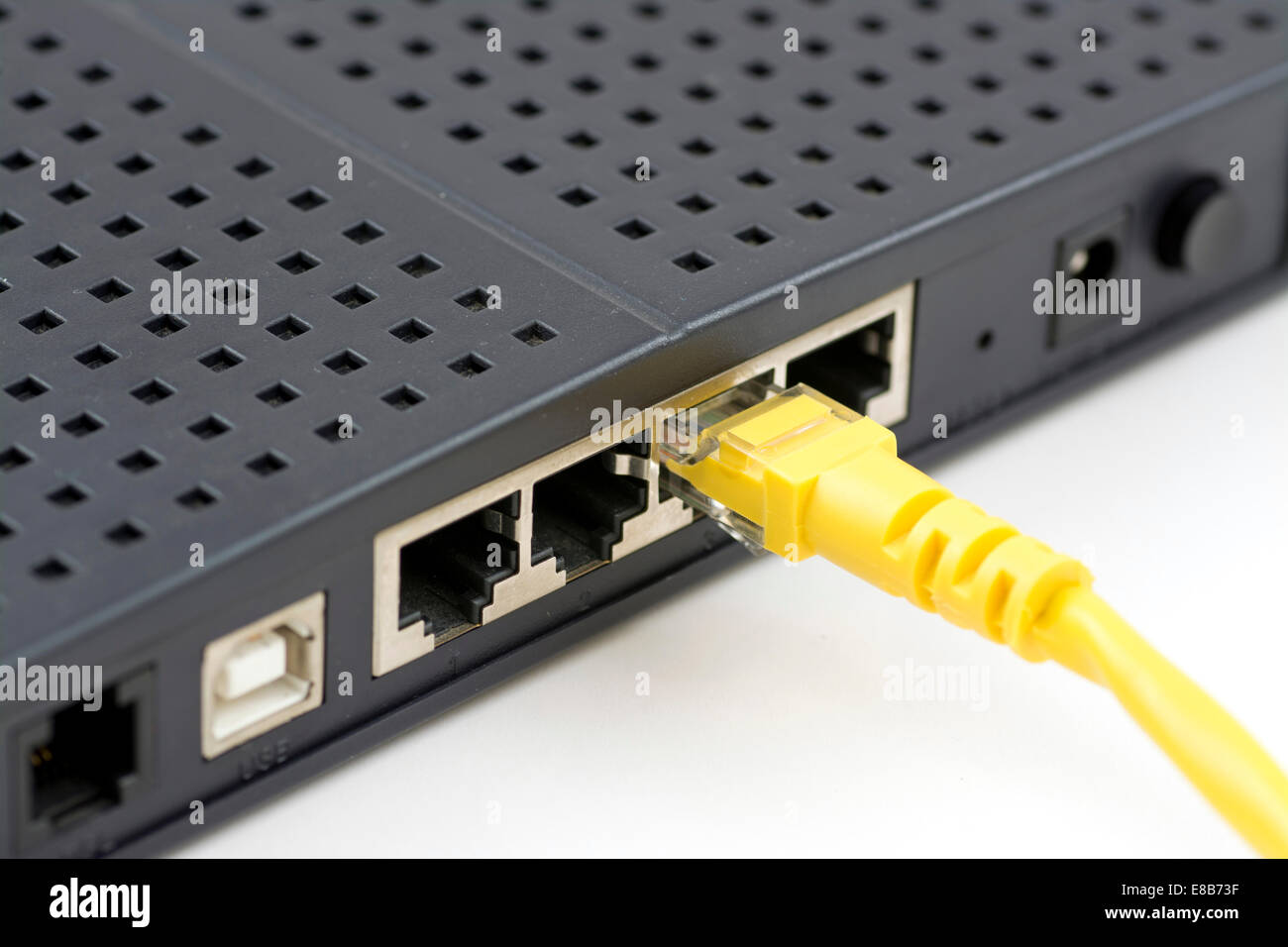 Network cable connected to a router Stock Photo - Alamy