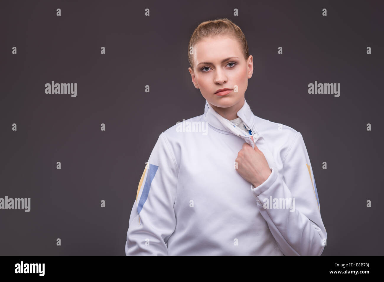 Young woman engaging in fencing Stock Photo - Alamy