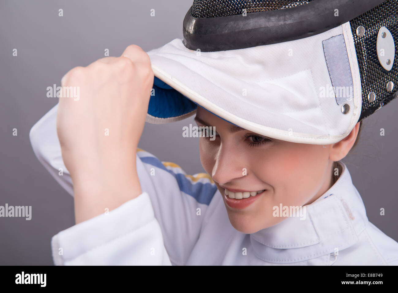 Young woman engaging in fencing Stock Photo - Alamy