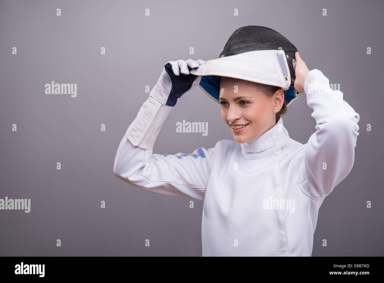 Young woman engaging in fencing Stock Photo - Alamy