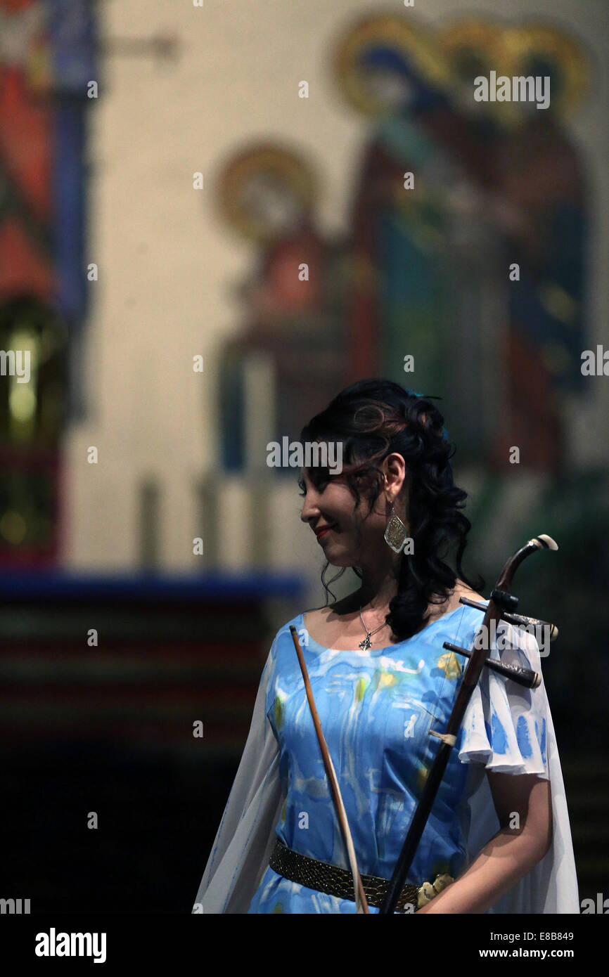 Frankfurt, Germany. 3rd Oct, 2014. Chinese musician Ma Xiaohui reacts ...