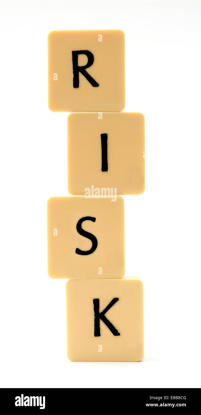 Risk, forming letters in slight balance Stock Photo - Alamy