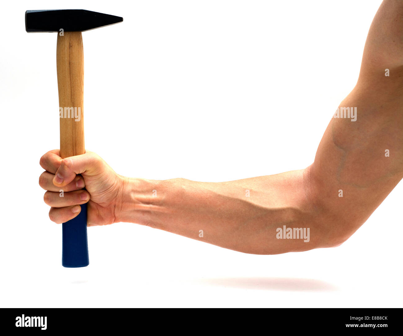 Hand holding a hammer Stock Photo - Alamy