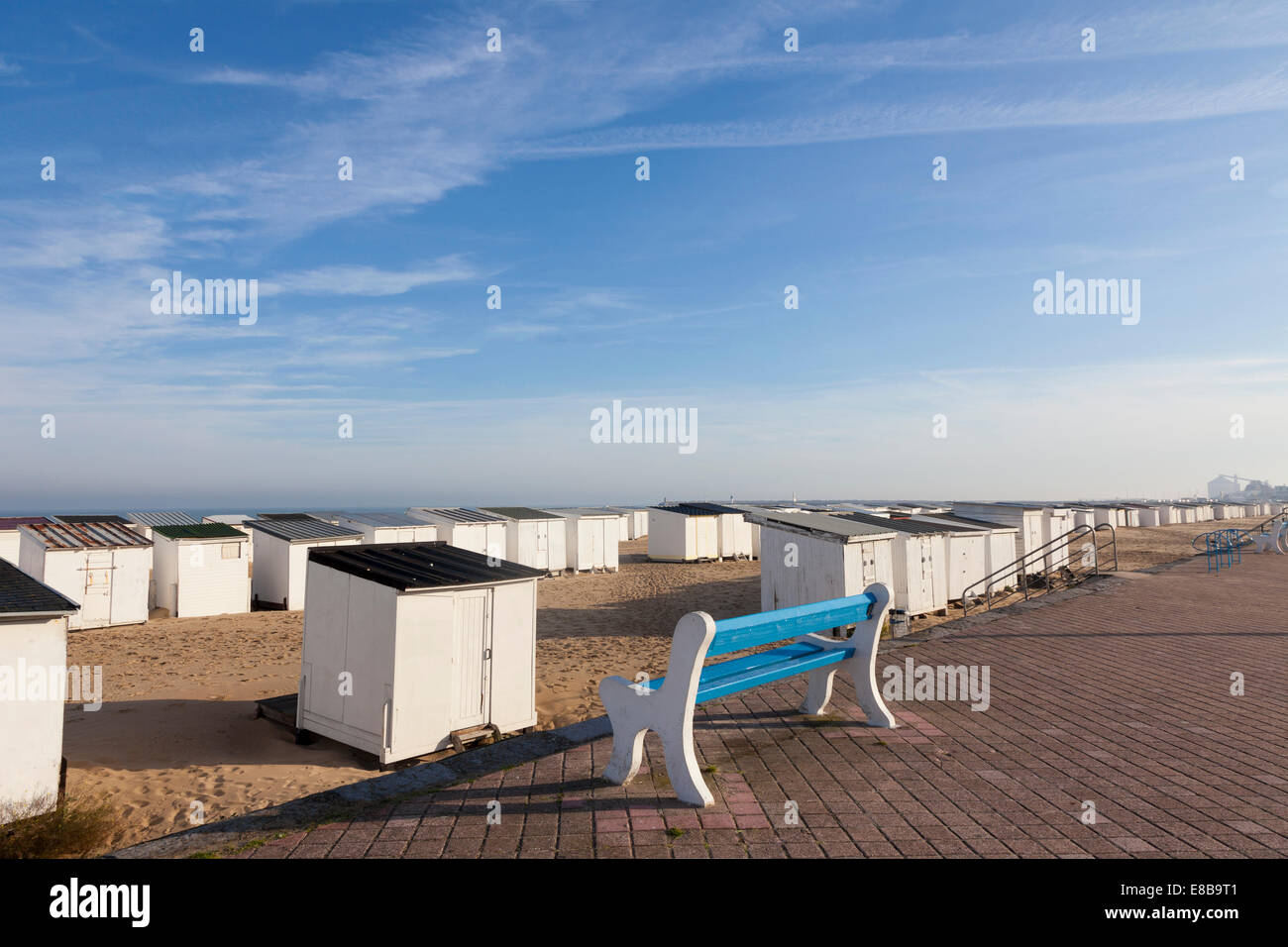 Blue bench and seafront huts on the beach, Calais, France Stock Photo ...
