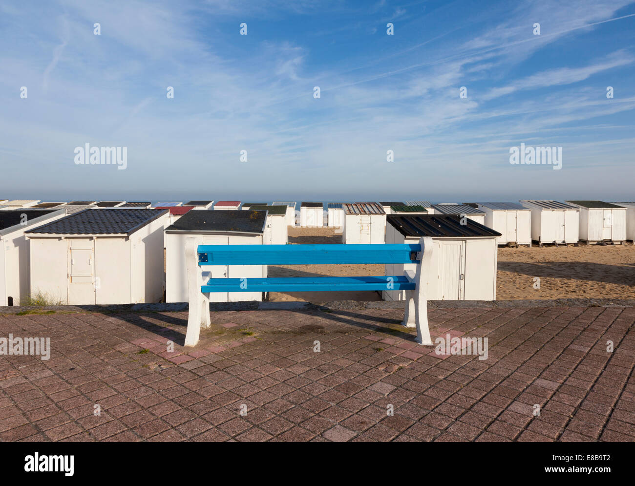 Blue bench and seafront huts on the beach, Calais, France Stock Photo ...