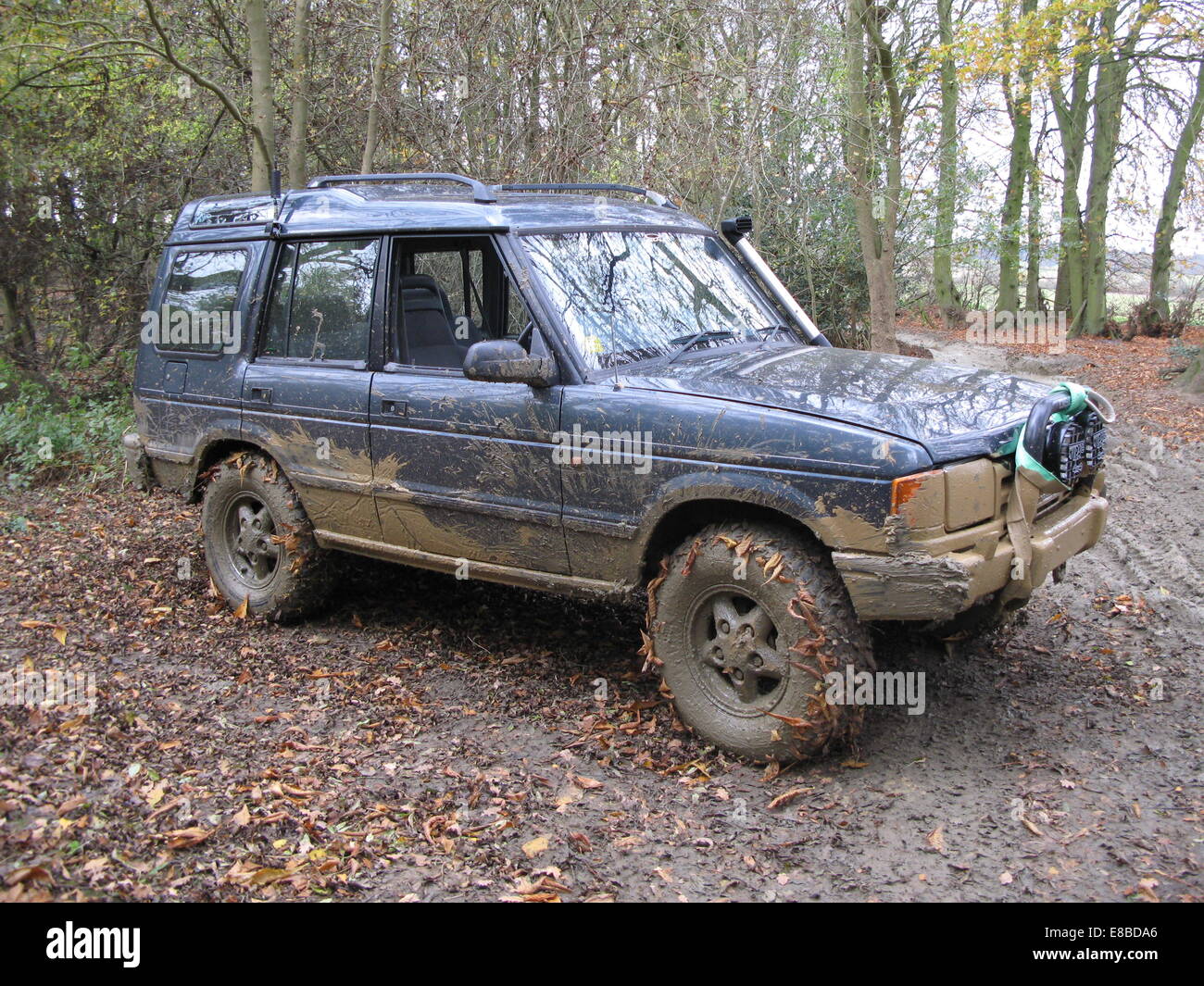 a very dirty muddy offroad car Stock Photo - Alamy