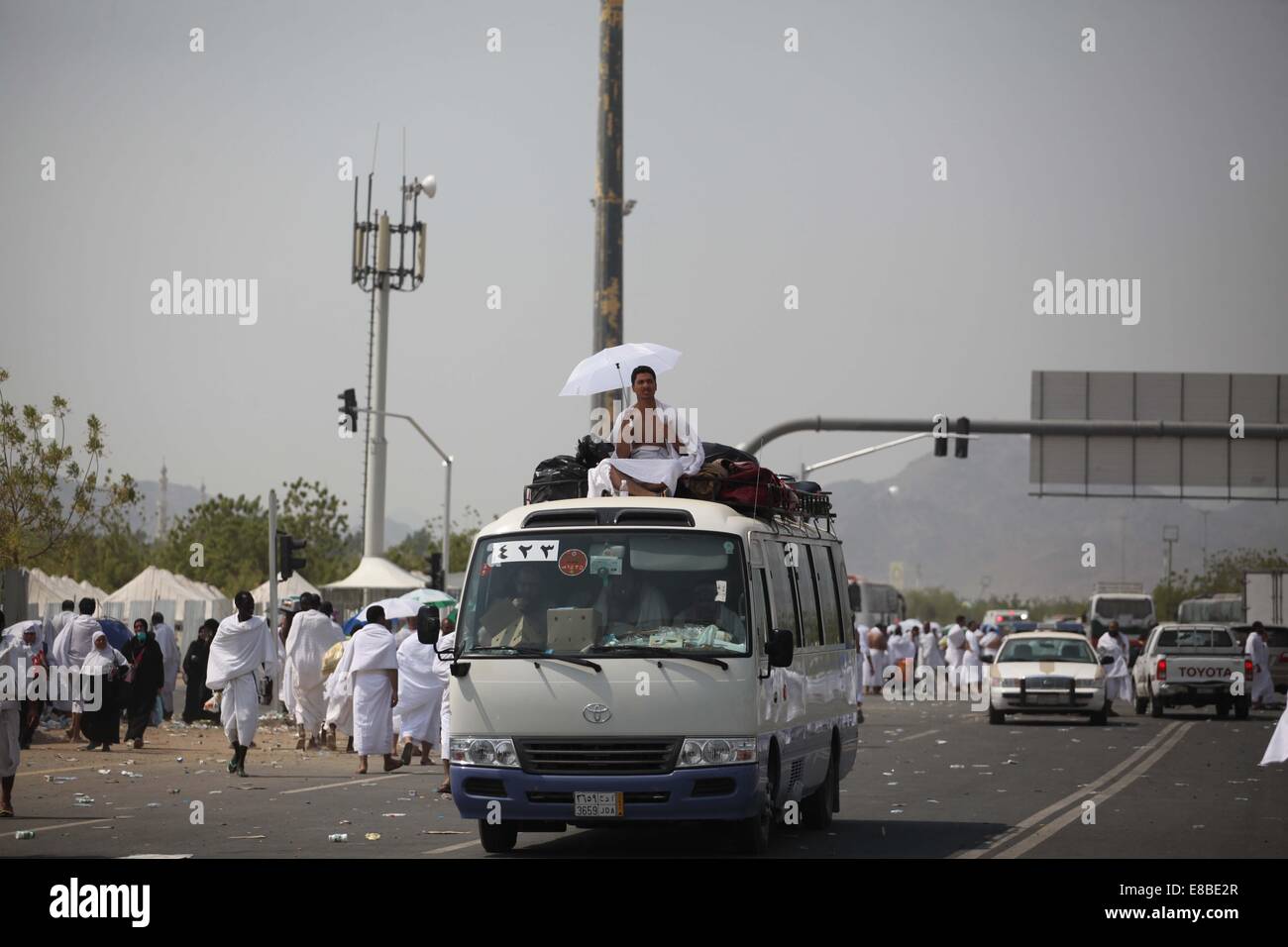 Mecca, Saudi Arabia. 3rd Oct, 2014. Muslim pilgrims walk as they leave ...