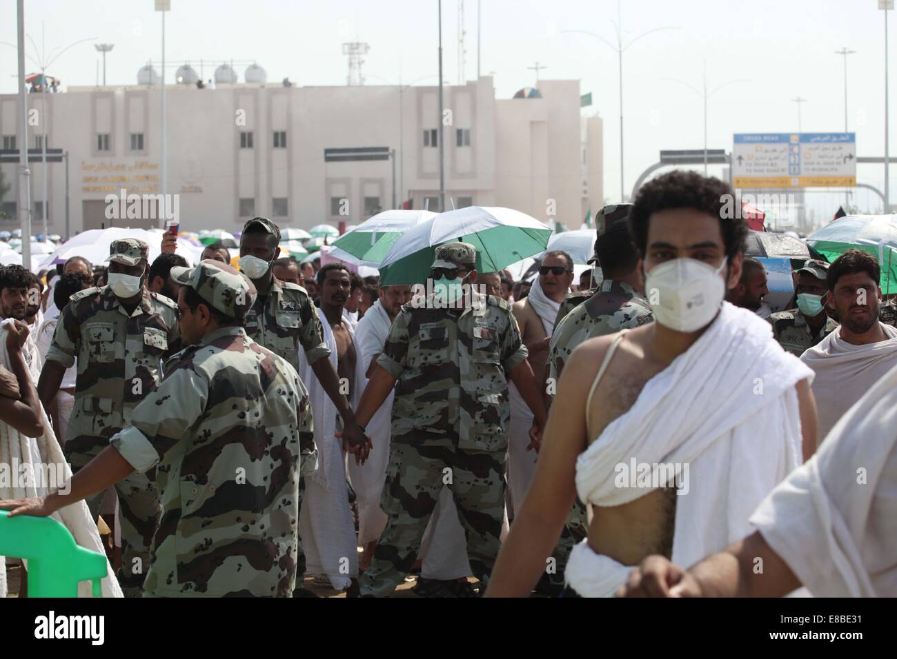 Mecca, Saudi Arabia. 3rd Oct, 2014. Muslim pilgrims walk as they leave ...