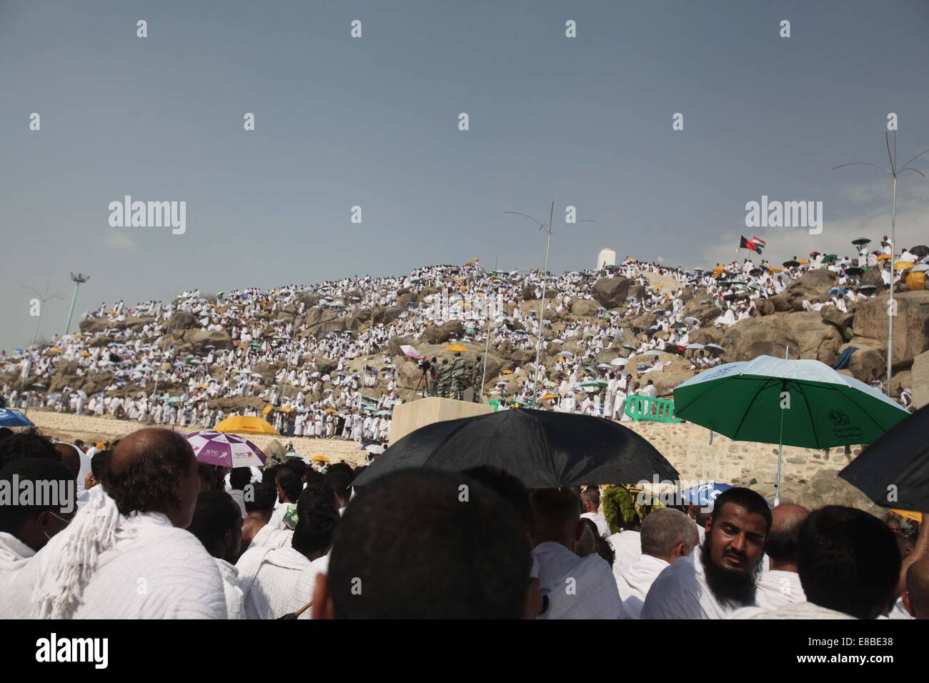Mecca, Saudi Arabia. 3rd Oct, 2014. Muslim pilgrims walk as they leave ...