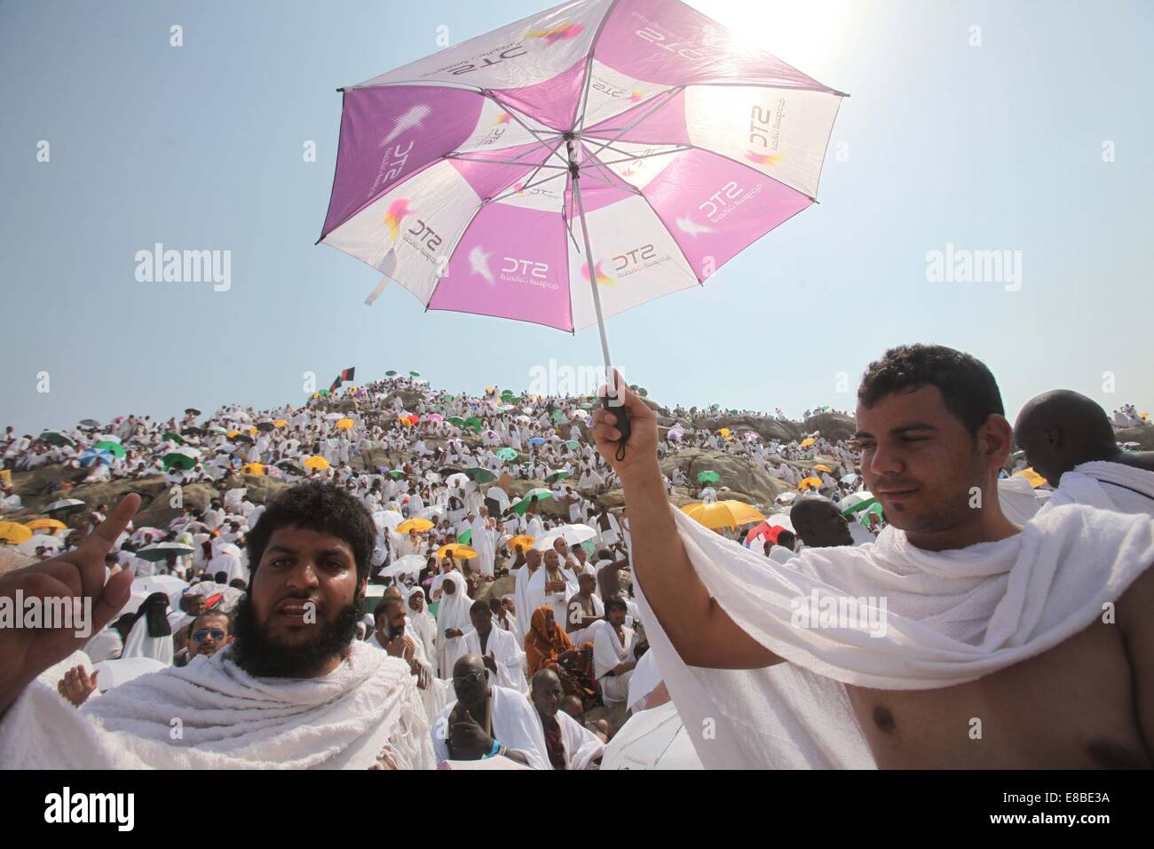Mecca, Saudi Arabia. 3rd Oct, 2014. Muslim pilgrims walk as they leave ...