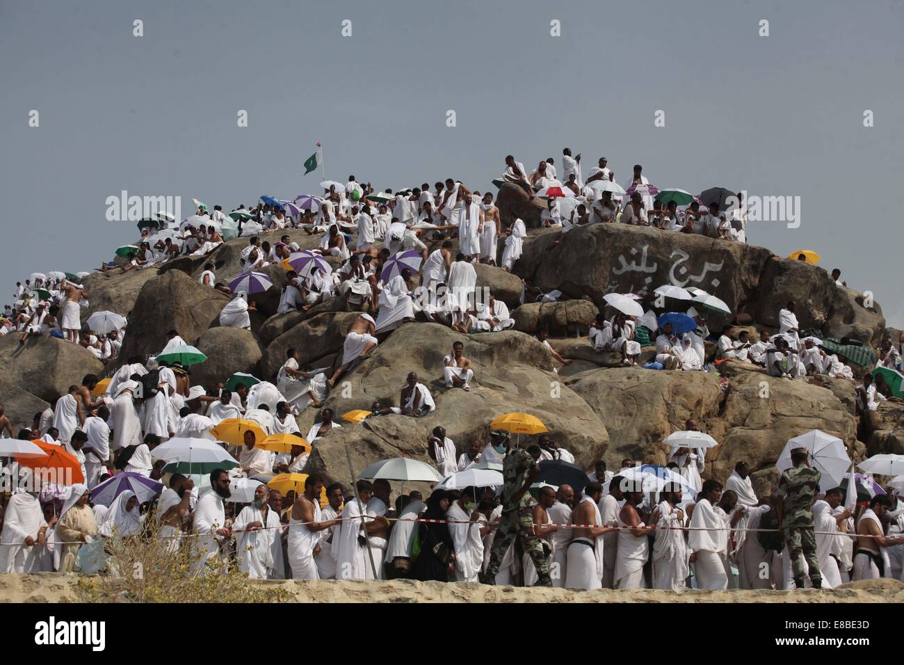 Mecca, Saudi Arabia. 3rd Oct, 2014. Muslim pilgrims walk as they leave ...