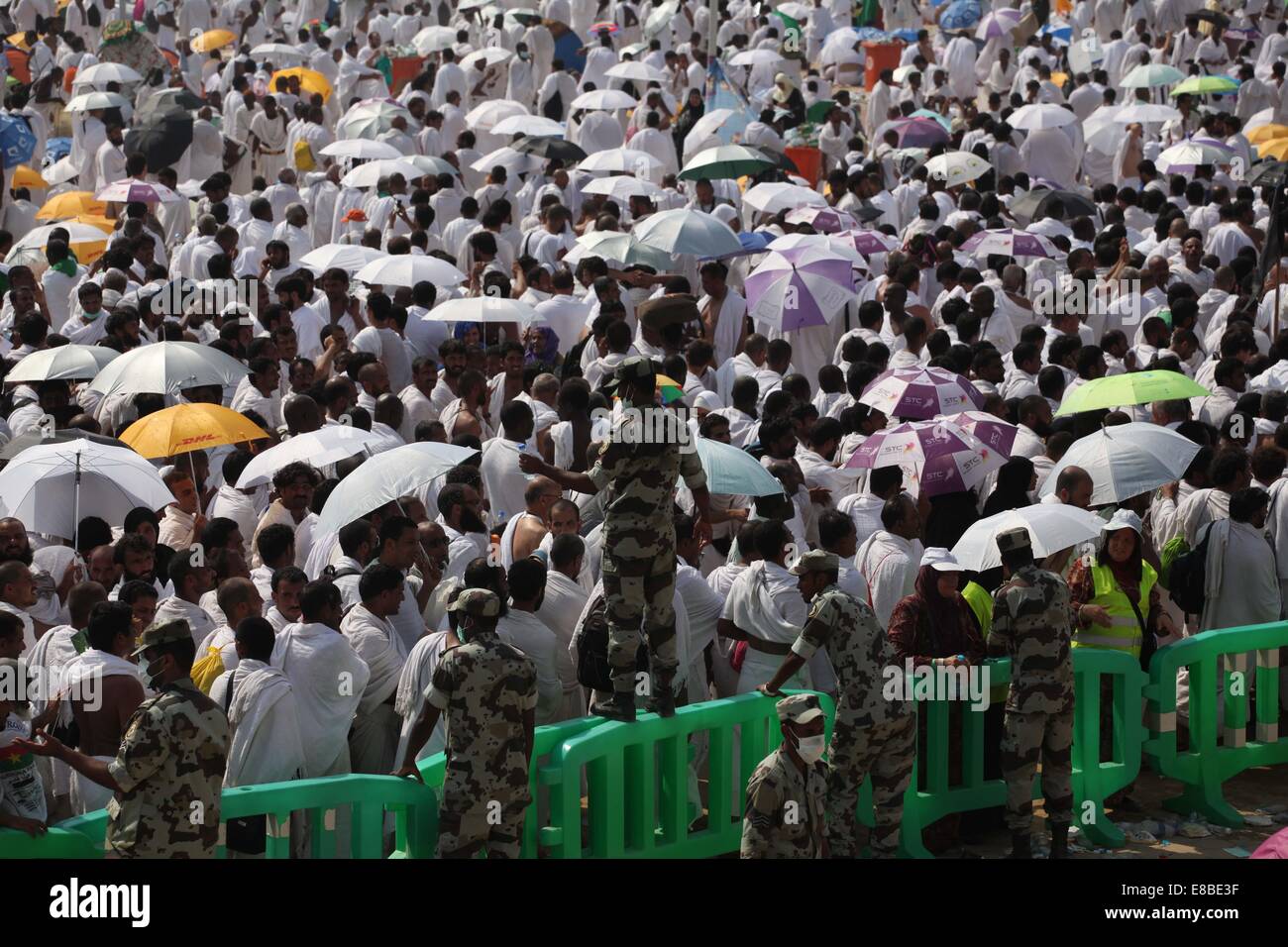 Mecca, Saudi Arabia. 3rd Oct, 2014. Muslim pilgrims walk as they leave ...