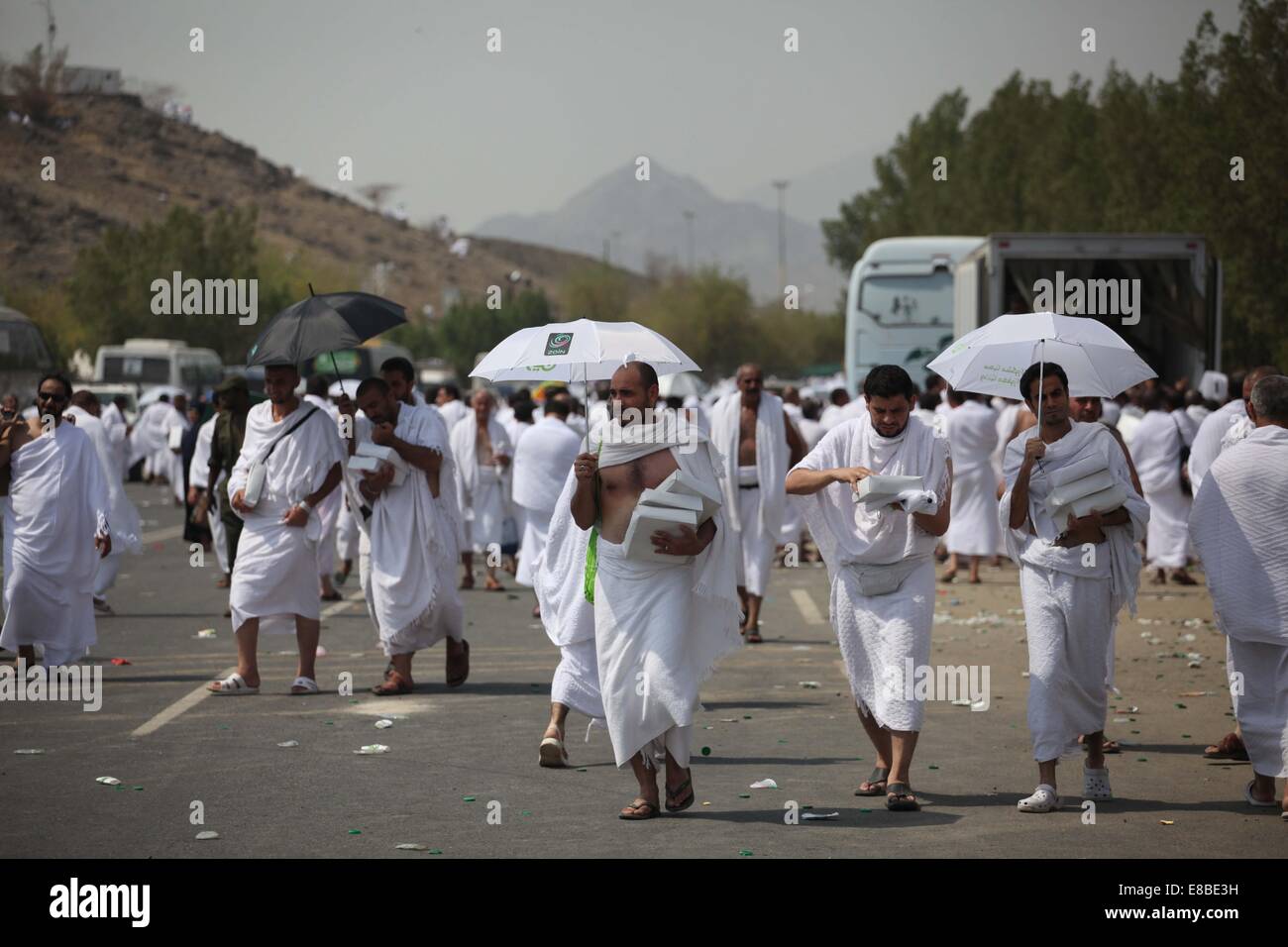 Mecca, Saudi Arabia. 3rd Oct, 2014. Muslim pilgrims walk as they leave ...