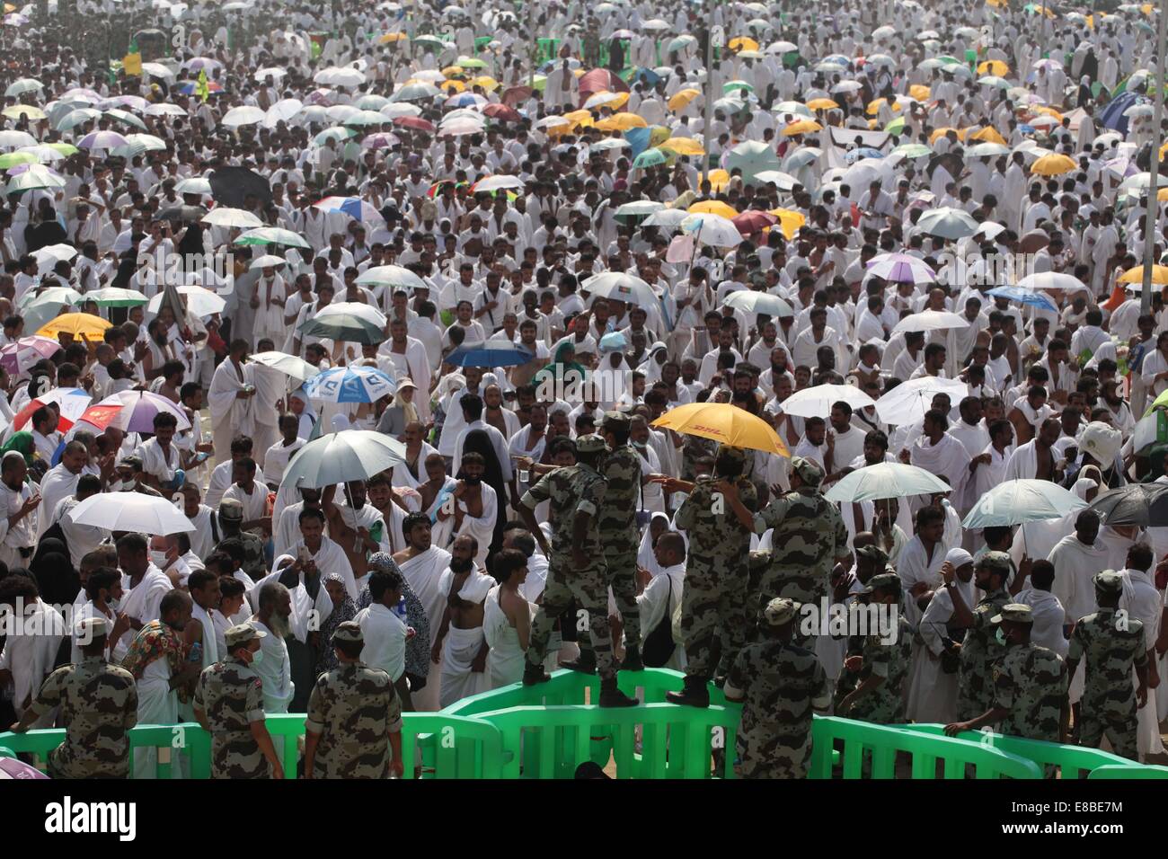 Mecca, Saudi Arabia. 3rd Oct, 2014. Muslim pilgrims walk as they leave ...