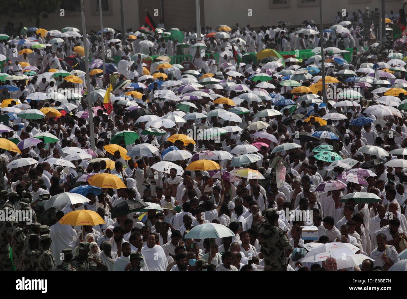 Mecca, Saudi Arabia. 3rd Oct, 2014. Muslim pilgrims walk as they leave ...