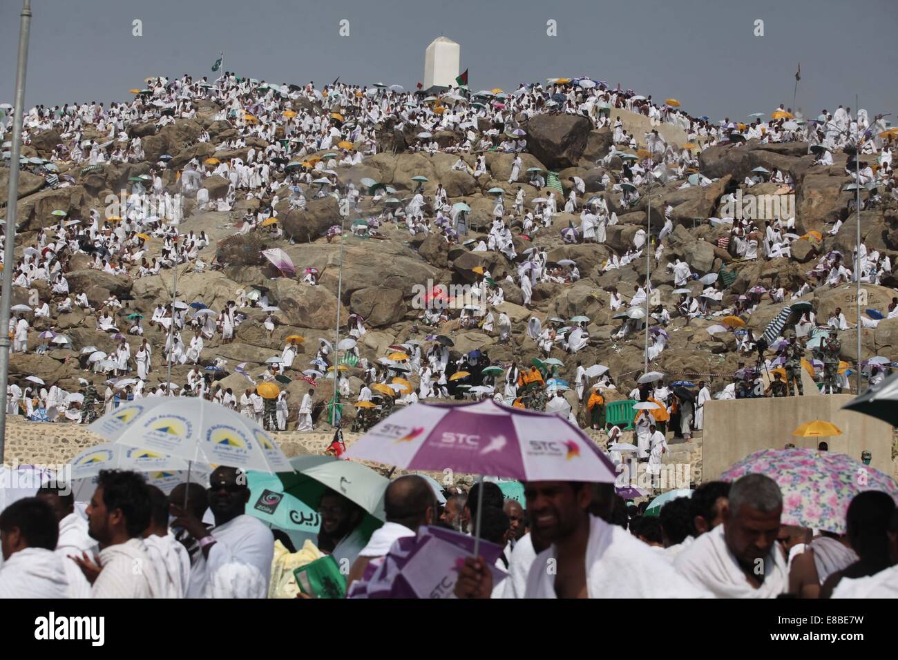 Mecca, Saudi Arabia. 3rd Oct, 2014. Muslim pilgrims walk as they leave ...
