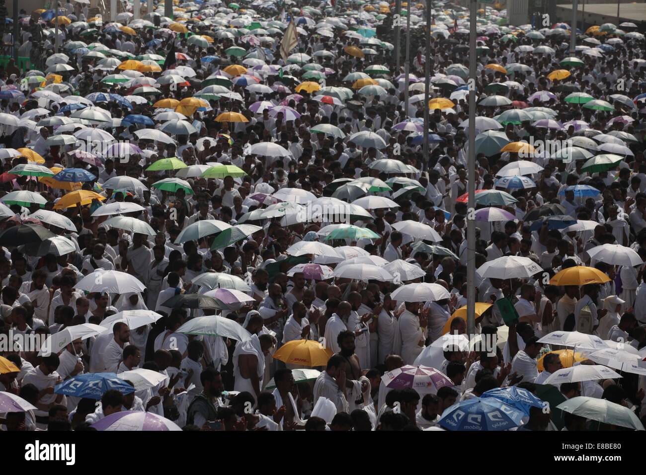 Mecca, Saudi Arabia. 3rd Oct, 2014. Muslim pilgrims walk as they leave ...