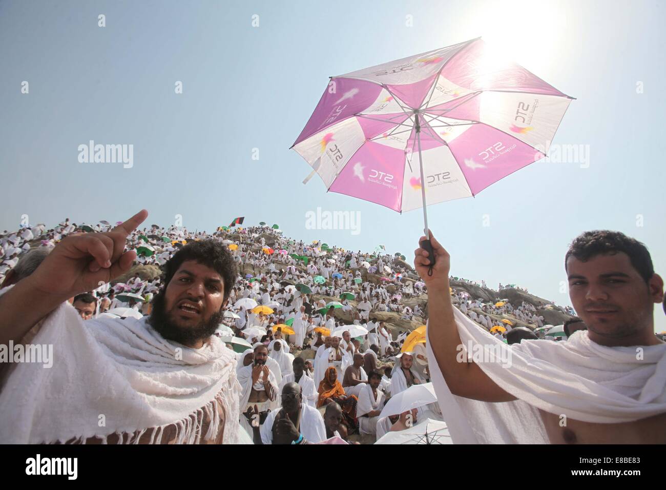 Mecca, Saudi Arabia. 3rd Oct, 2014. Muslim pilgrims walk as they leave ...