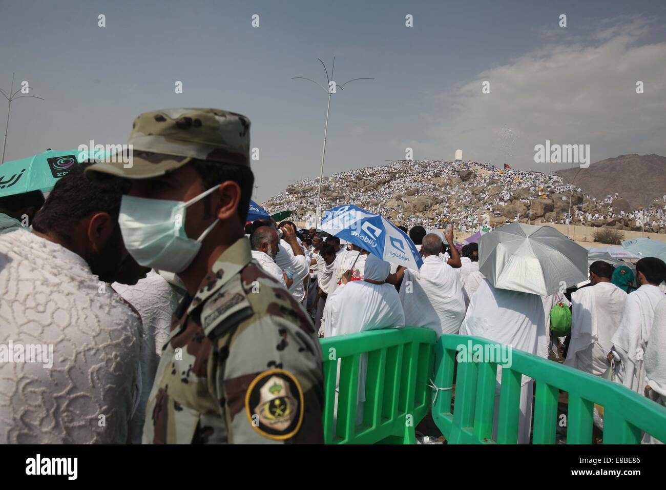 Mecca, Saudi Arabia. 3rd Oct, 2014. Muslim pilgrims walk as they leave ...