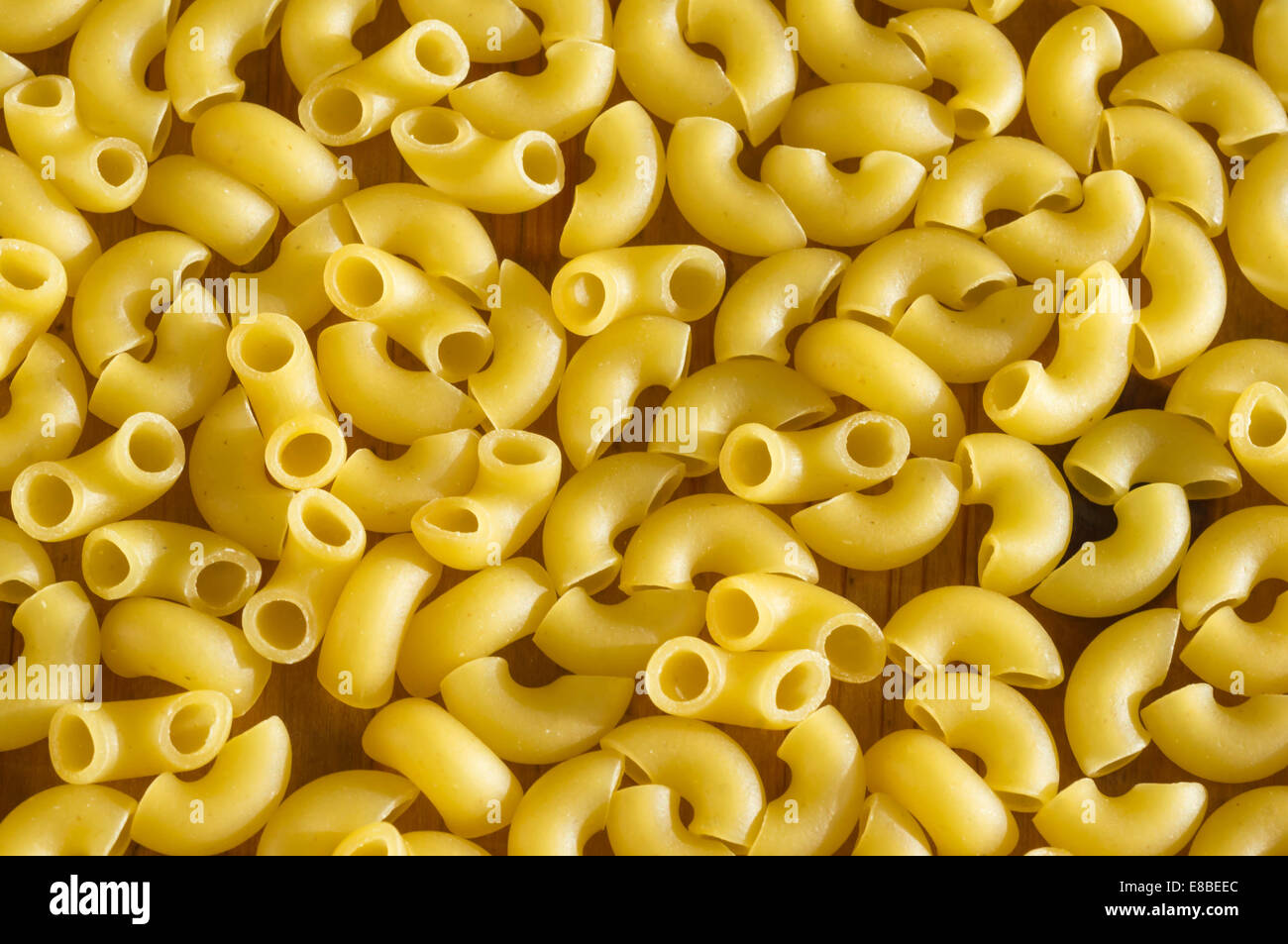Yellow macaroni food background hi-res stock photography and images - Alamy