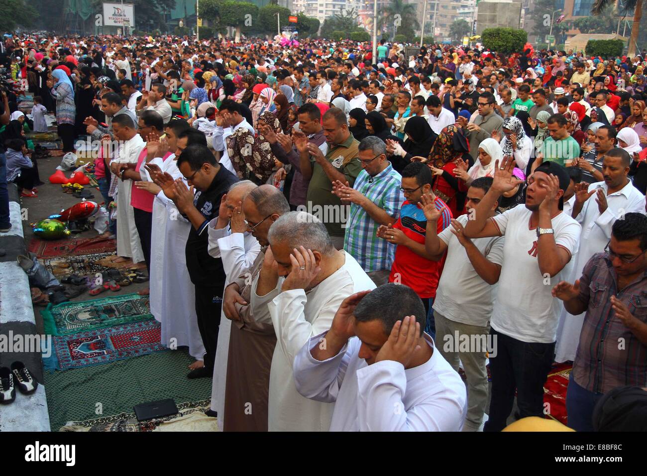 Cairo, Egypt. 4th Oct, 2014. Egyptian Muslims pray during the Eid al ...