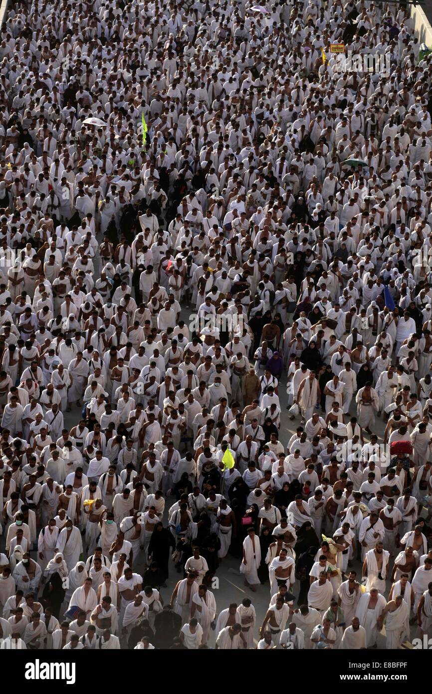 Mina, Mecca, Saudi Arabia. 4th Oct, 2014. Muslim pilgrims walk to cast ...