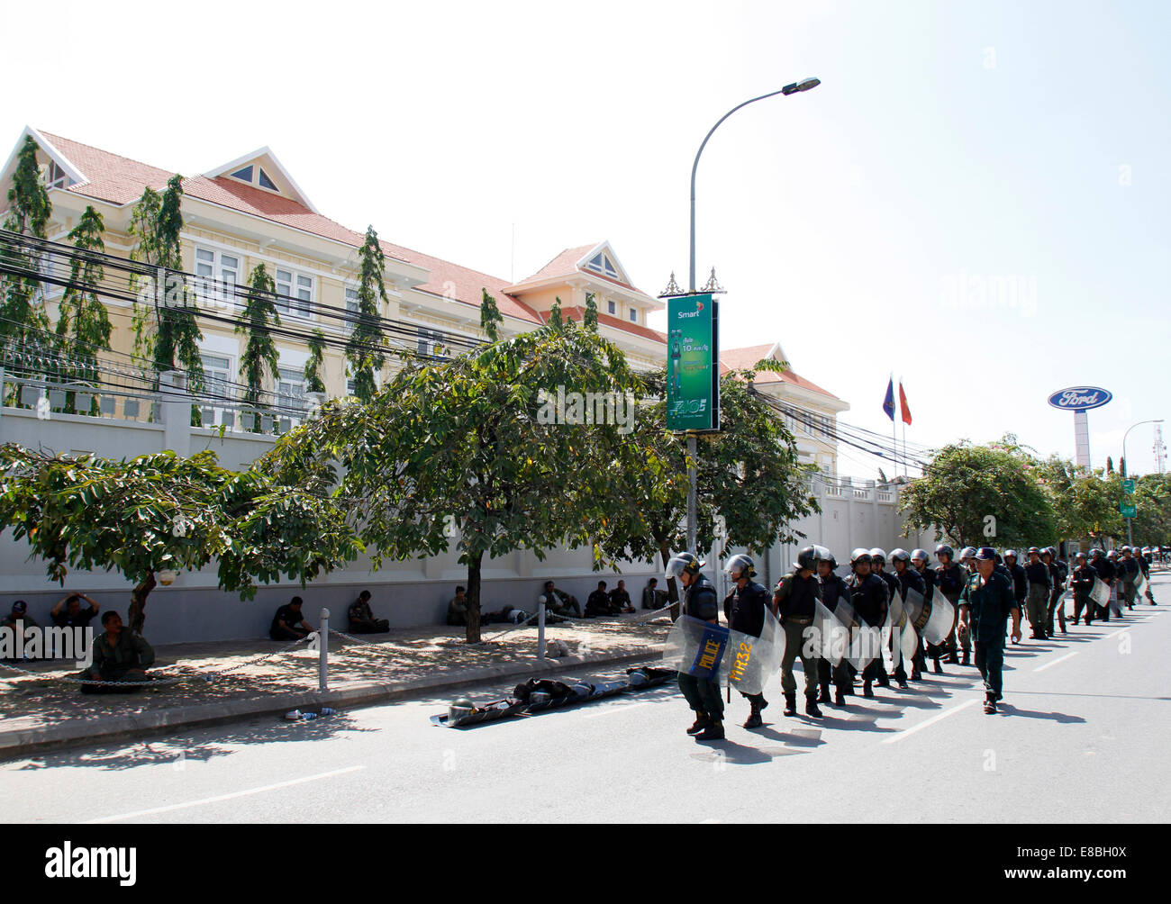Phnom Penh, Cambodia. 4th Oct, 2014. Riot police stand guard near the ...