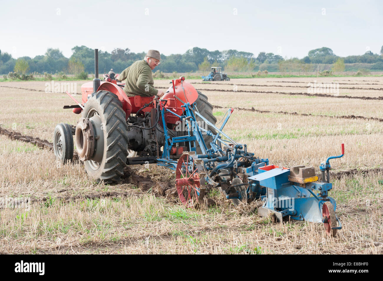 Side view of tractor with plough hi-res stock photography and images ...