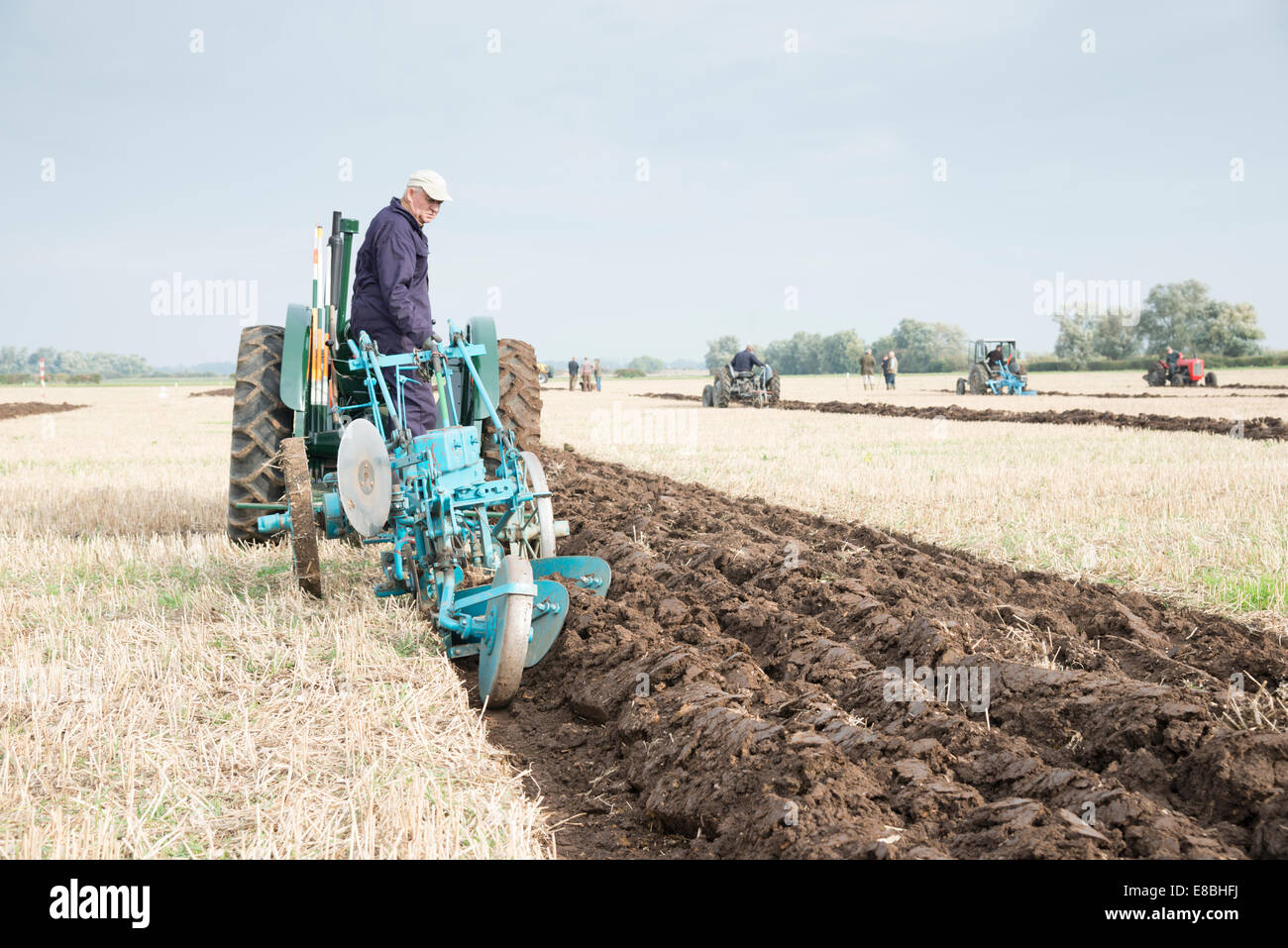 Side view of tractor with plough hi-res stock photography and images ...