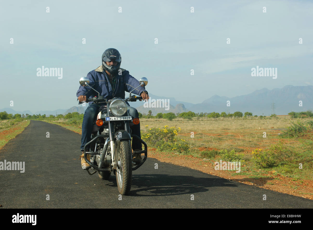 Rider riding a bike Stock Photo - Alamy