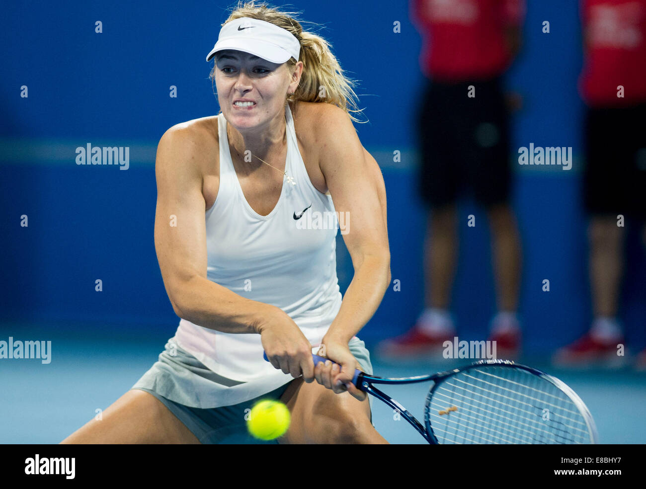 Beijing, China. 4th Oct, 2014. Maria Sharapova of Russia returns a hit ...