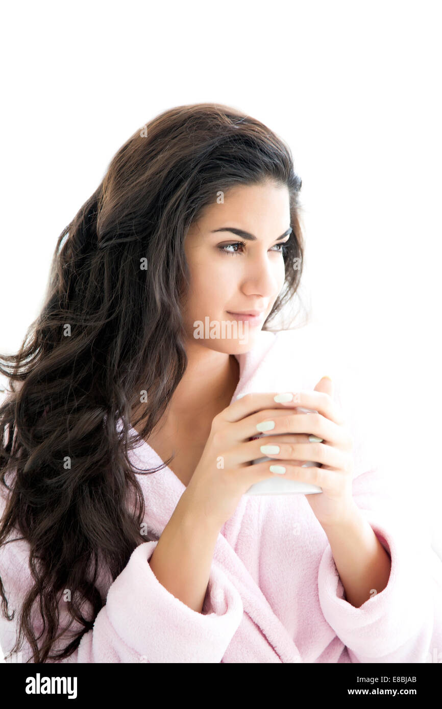 Young woman having a morning coffee Stock Photo - Alamy