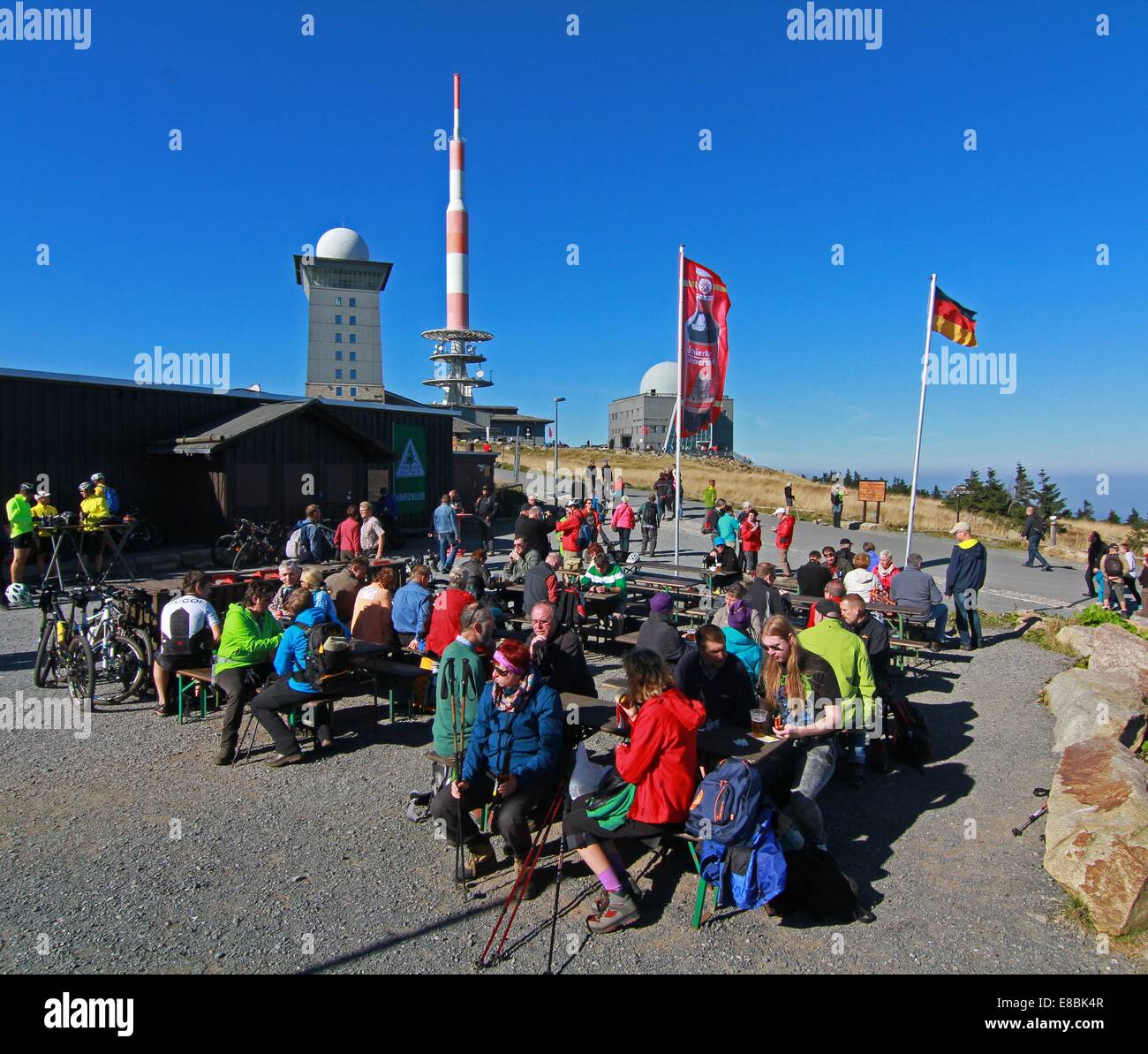 Numerous people visit the summit of Brocken Mountain in the sunny ...