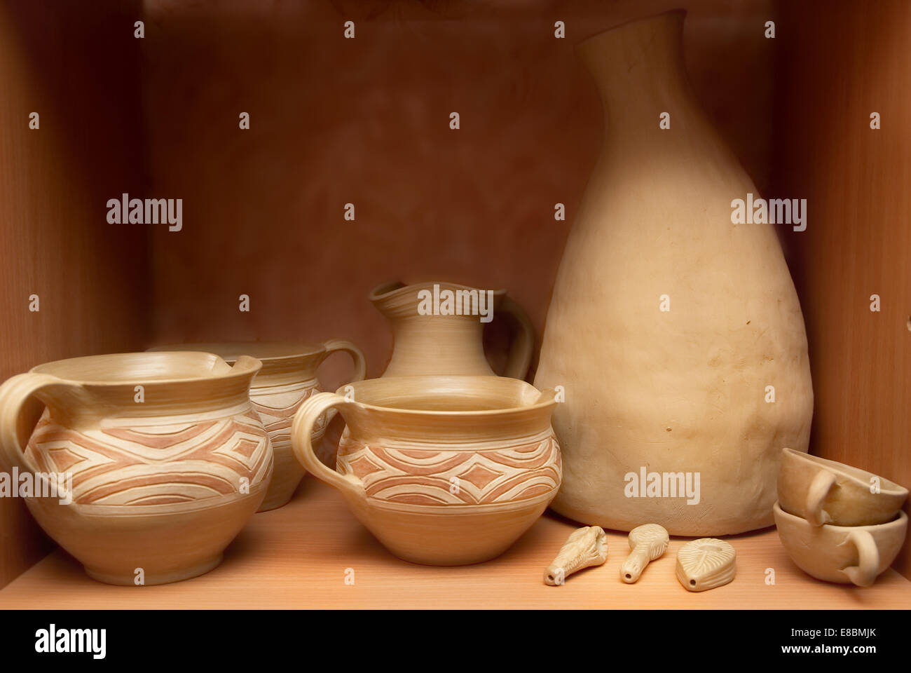 Many handmade old clay pots on the shelf Stock Photo - Alamy