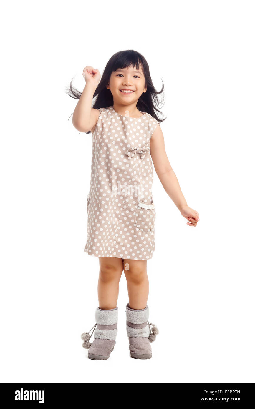 Happy fashion asian child with fun on white background Stock Photo - Alamy
