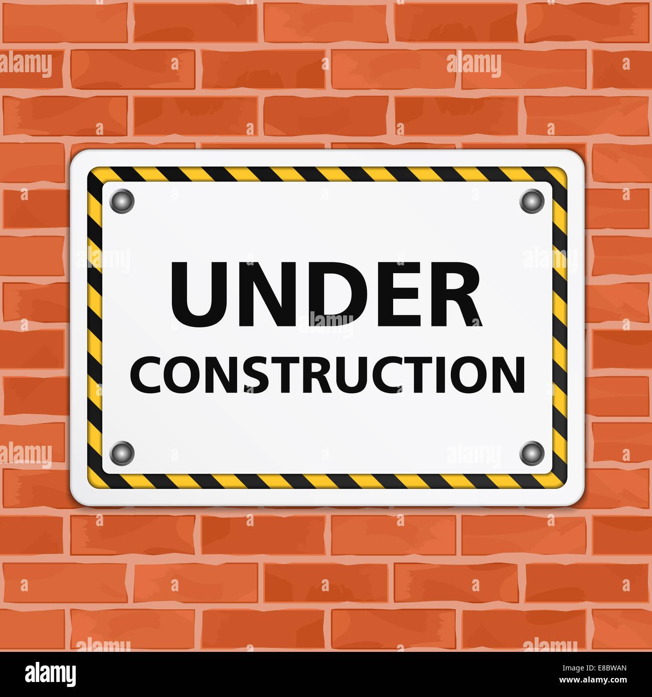 Under construction sign on brick wall Stock Photo - Alamy