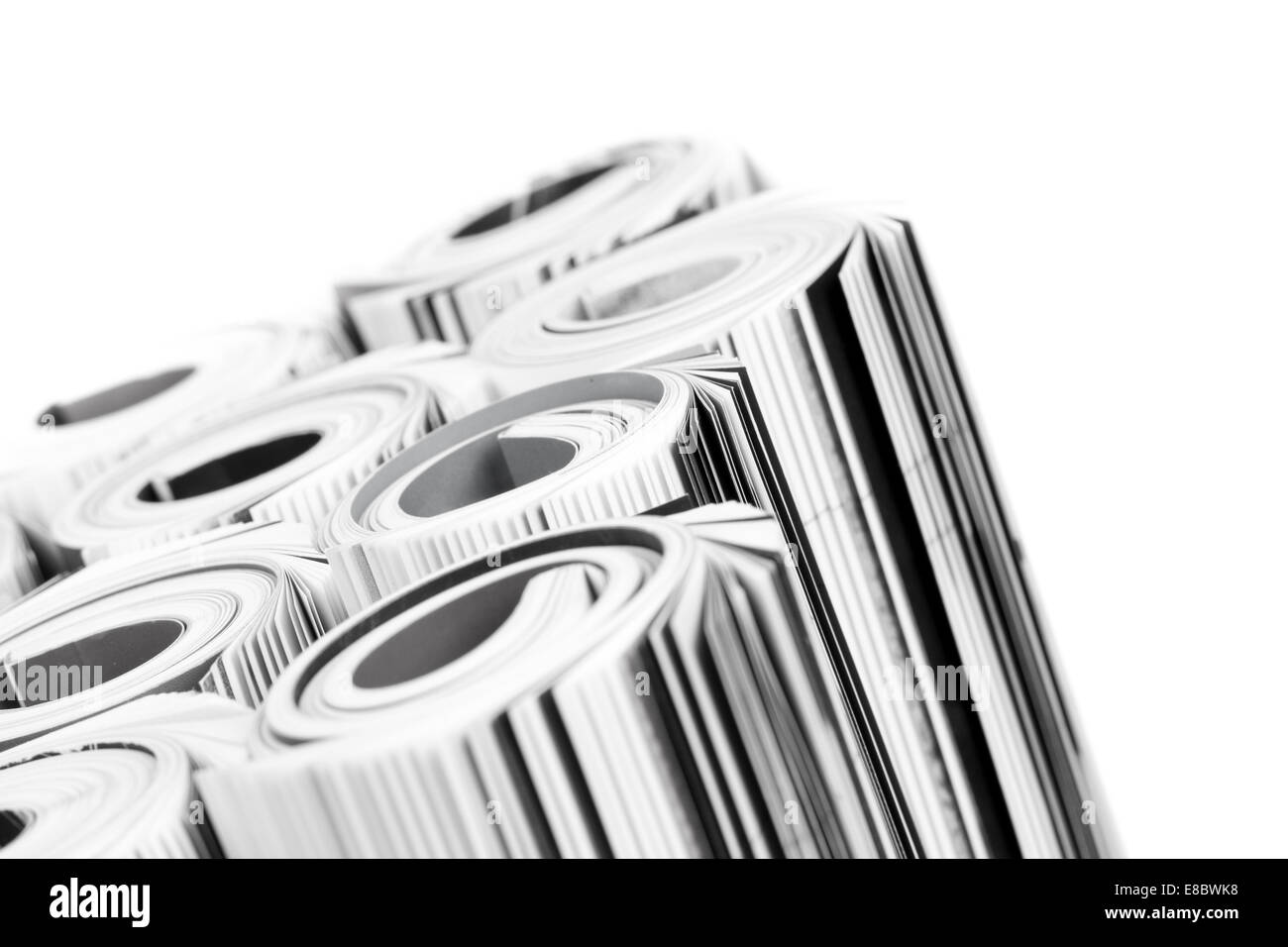 Stack of color magazines on white background Stock Photo - Alamy