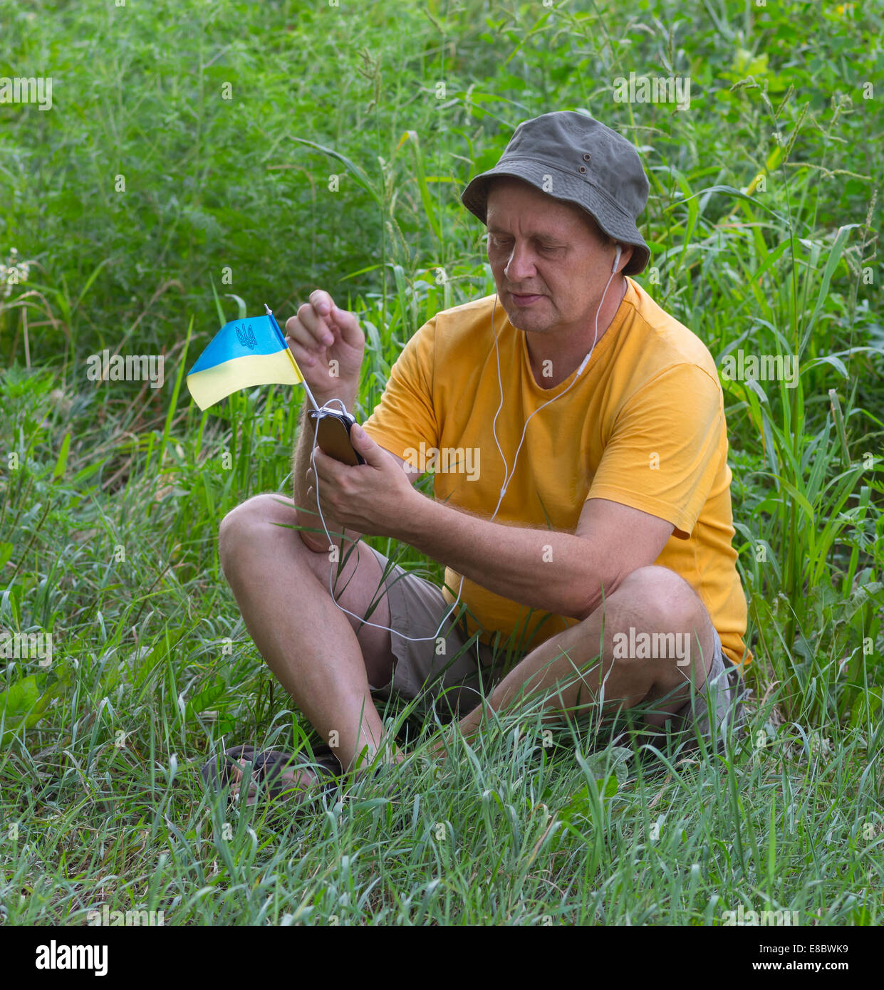 Listen music pose hi-res stock photography and images - Alamy