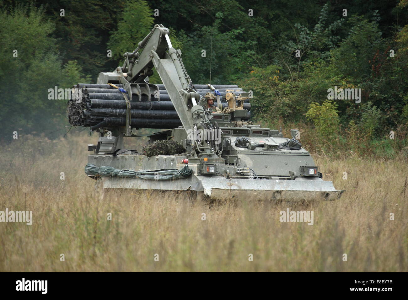 Trojan armoured vehicle armoured engineer vehicle moves cross country ...