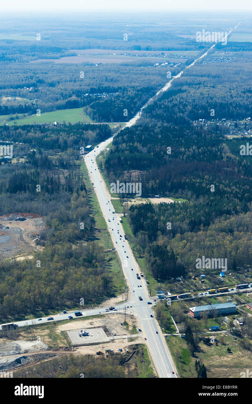 Aerial view of the road crossing among the forest in Russia Stock Photo ...