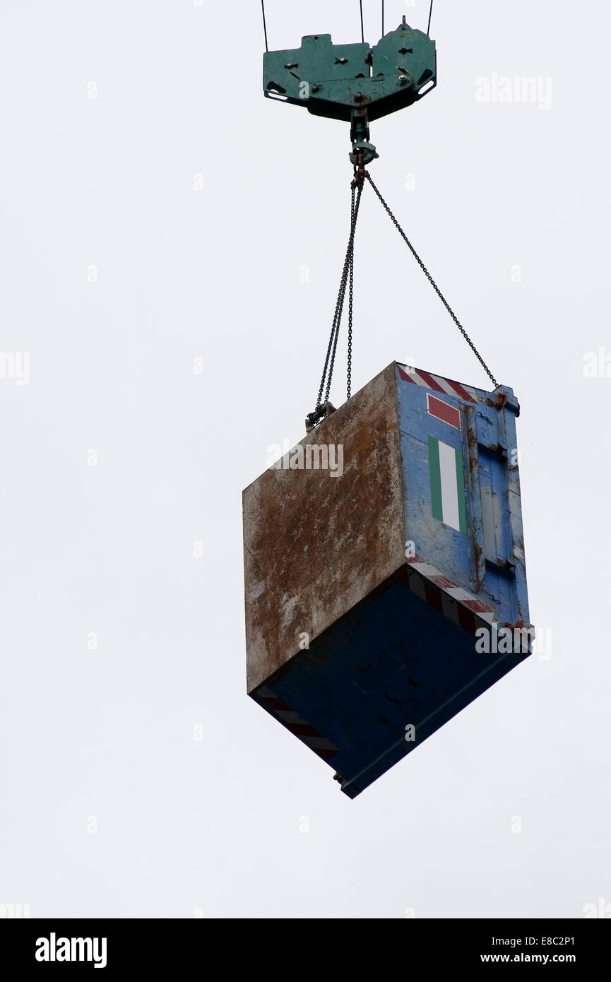 Crane hook with container Stock Photo - Alamy