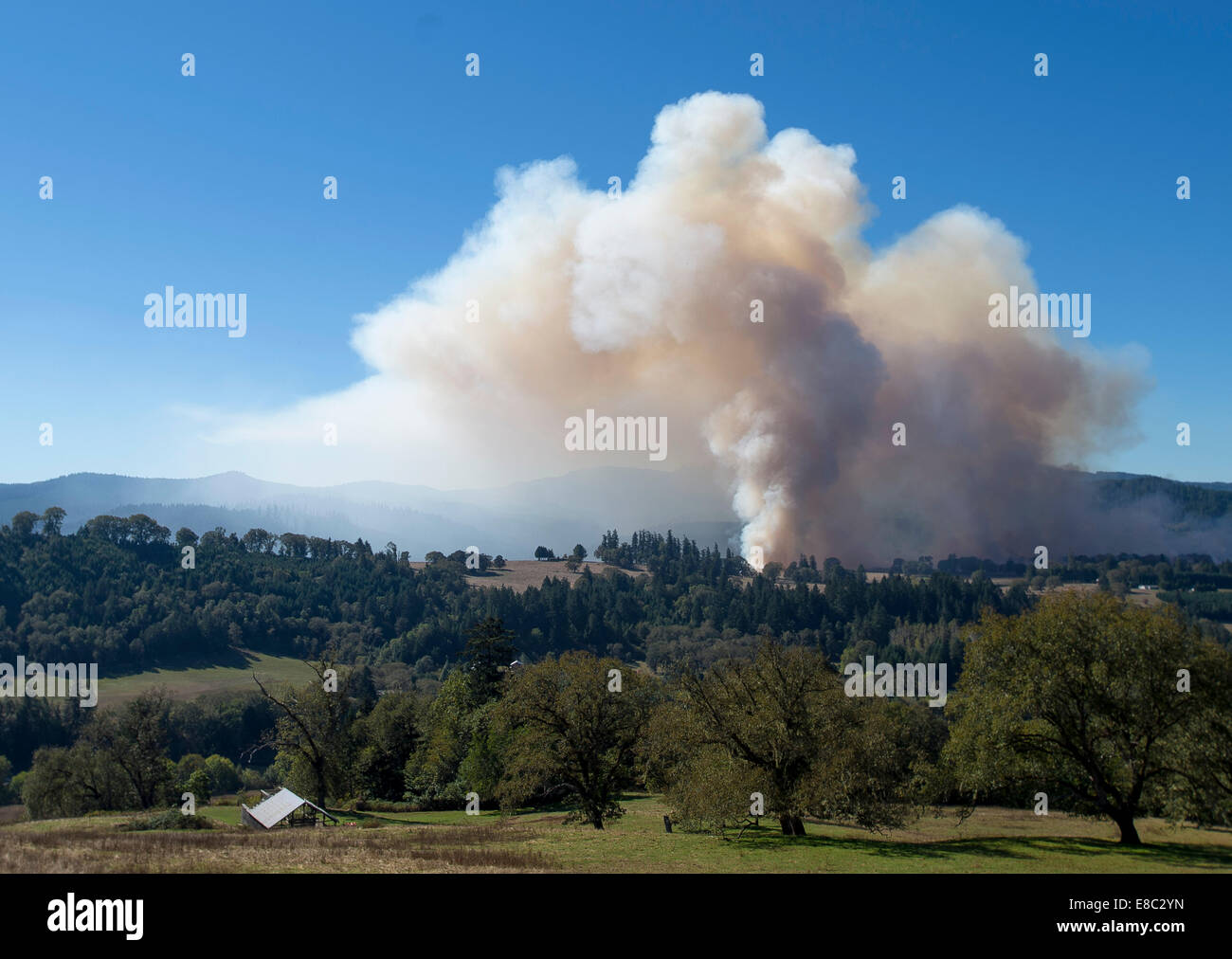 Elkton, Oregon, USA. 4th Oct, 2014. Smoke rises from a fire burning in ...