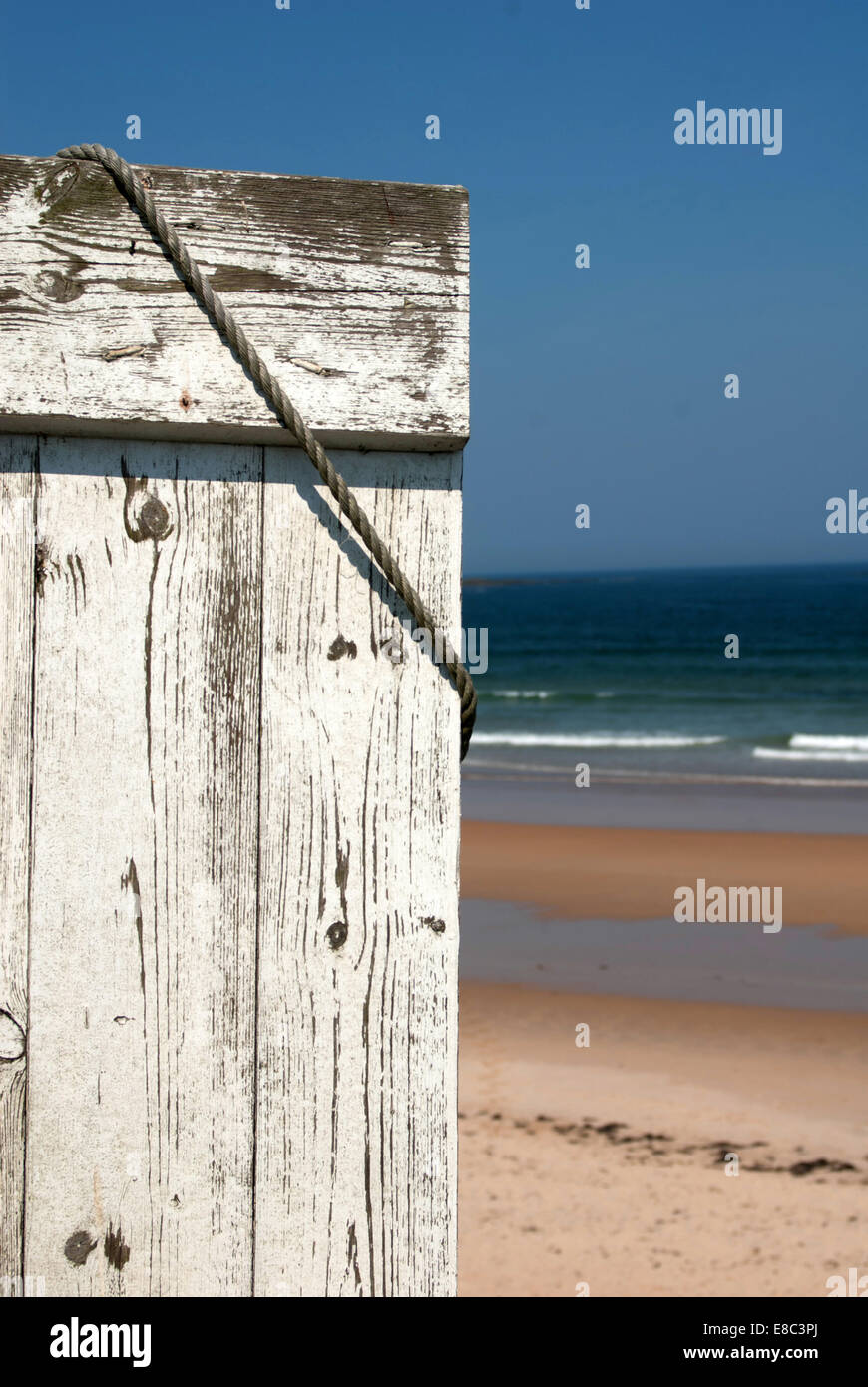 Weathered door on beach Stock Photo - Alamy