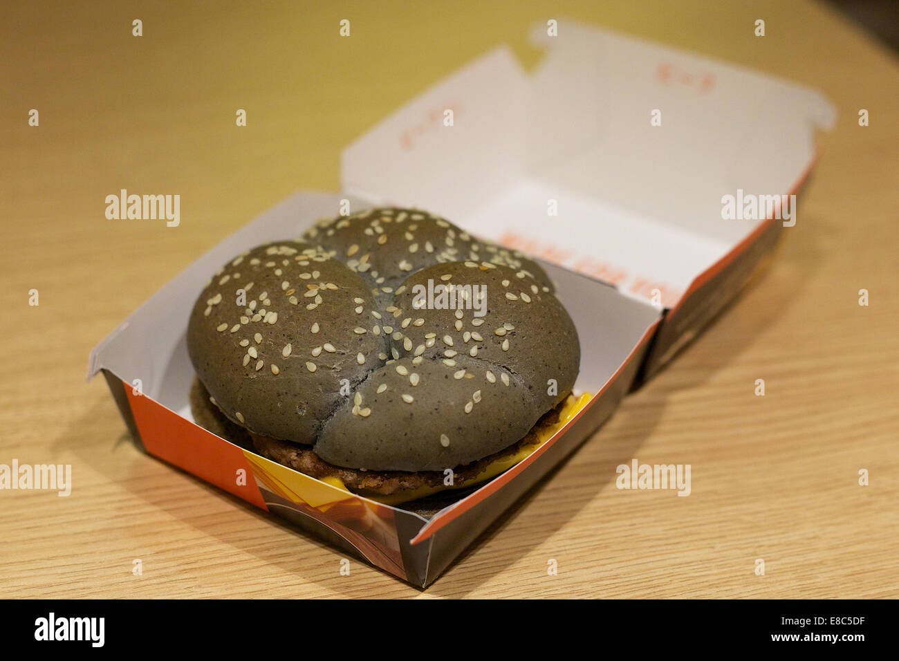 Tokyo, Japan. 4th Oct, 2014. The "Ikasumi burger" at McDonald's ...