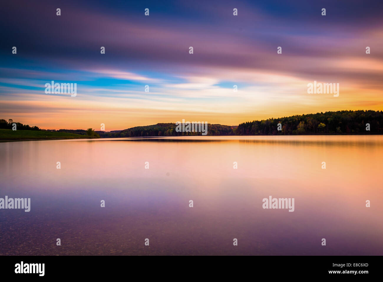 Evening long exposure of clouds moving over Long Arm Reservoir, near ...