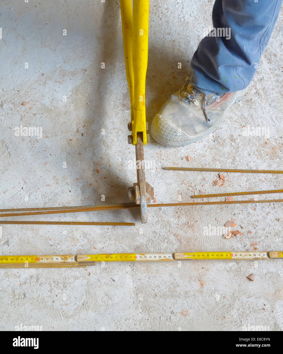 Worker cut steel with iron scissors in Construction Stock Photo - Alamy