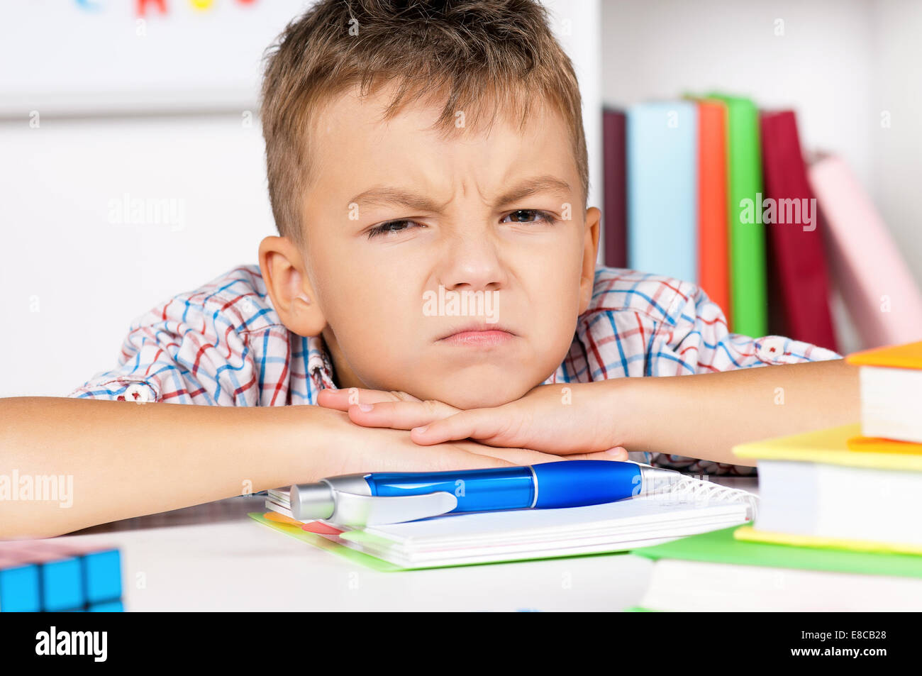 Boy doing homework Stock Photo - Alamy